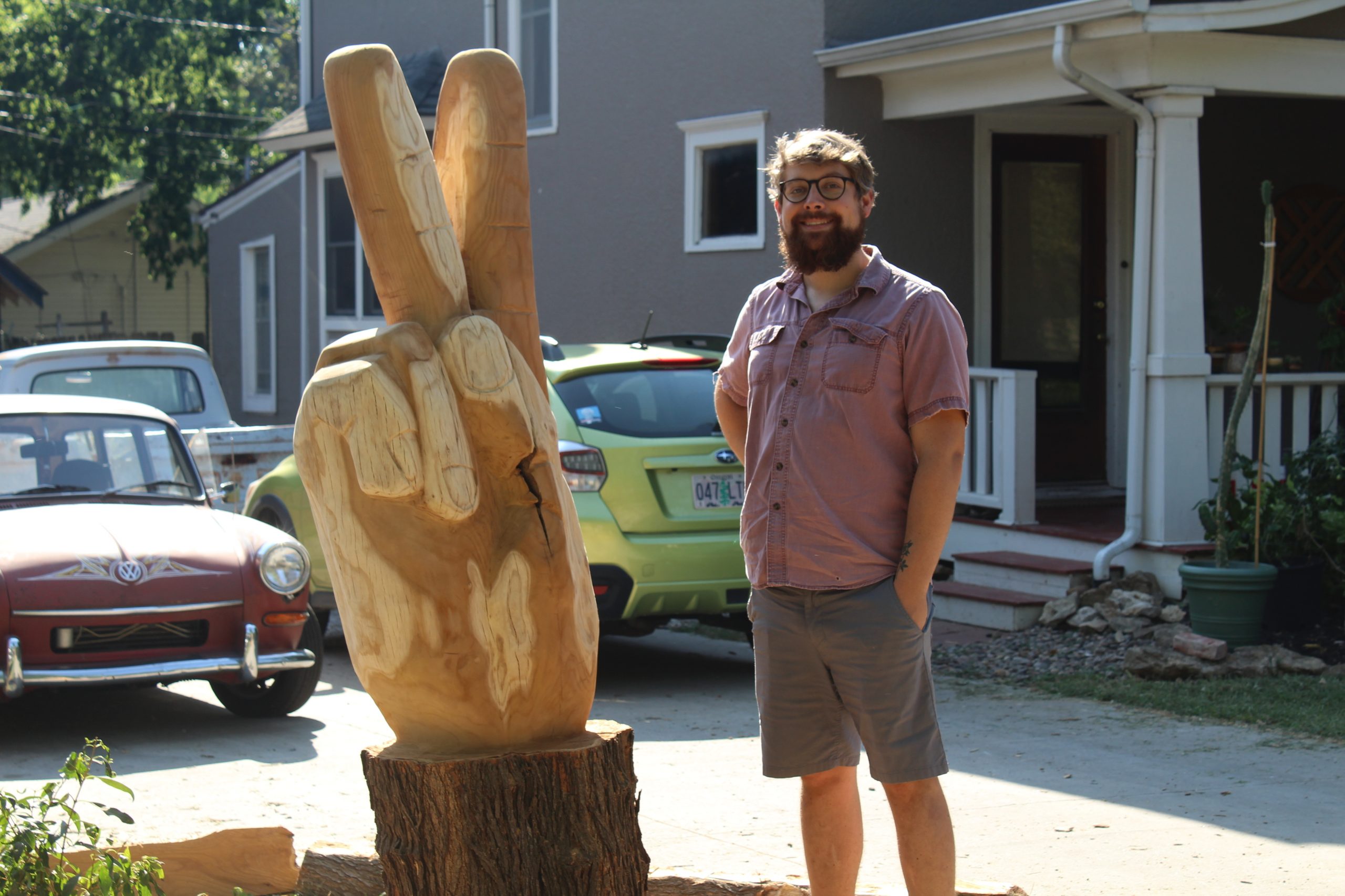 Peace sign on Mass. Street is result of dying tree that told woodcarver ...